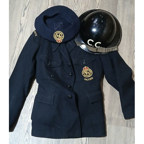A WWII Civil Defence Corps helmet, cap, jacket and pants.
