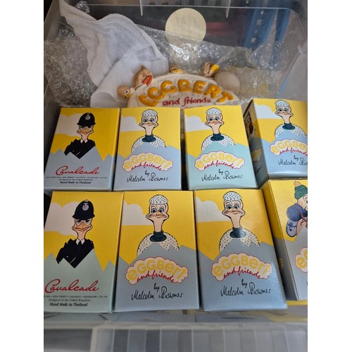 A collection of Eggbert figures.