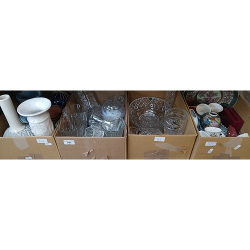 Four boxes of assorted pottery and glass.