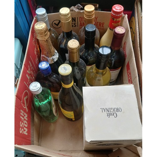 A box of assorted wines and spirits.