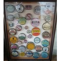 A display case of vintage ointment tins.
