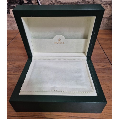 A Rolex green watch box with outer cardboard box 21.5cm x 16cm x 9.5cm.