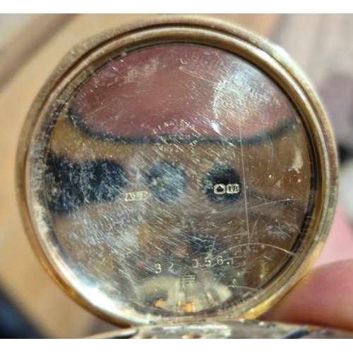 An 18ct gold Waltham USA open faced pocket watch, signed white enamel ...
