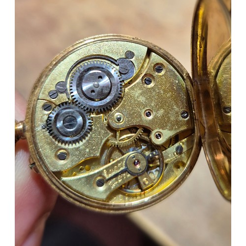 An 18ct gold open faced pocket watch, crown wind and adjust, import ...