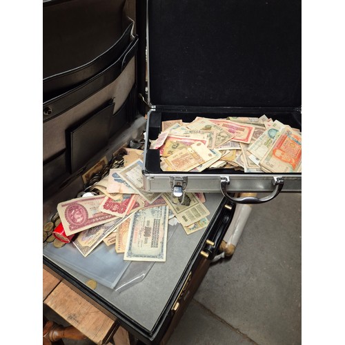 2 cases of world coins and banknotes