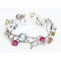 BOODLES, "Castaway", an 18ct white gold multi-gem set bracelet set with ...