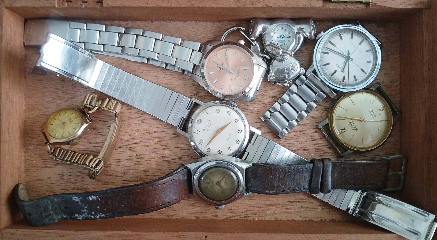 A box of assorted watches including a ladies 9ct gold wristwatch, an ...