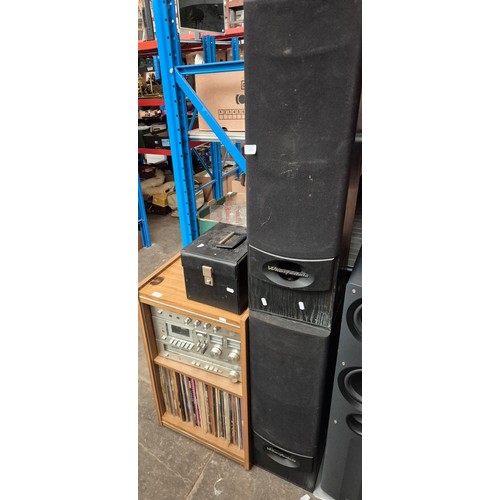 A Prinz stacking music system, with cabinet, various LPs, singles and 2 ...