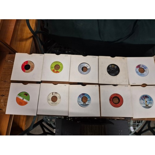 A Prinz stacking music system, with cabinet, various LPs, singles and 2 ...