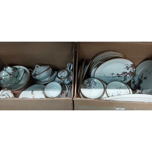 Two boxes of Japanese porcelain dinner ware.