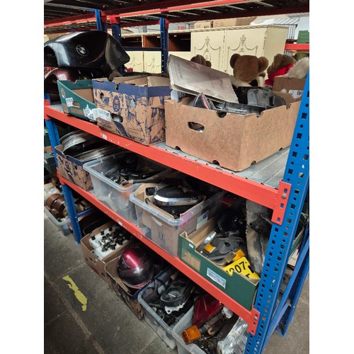 12 boxes on 3 shelves containing motorcycle parts including 2 BMW tanks ...