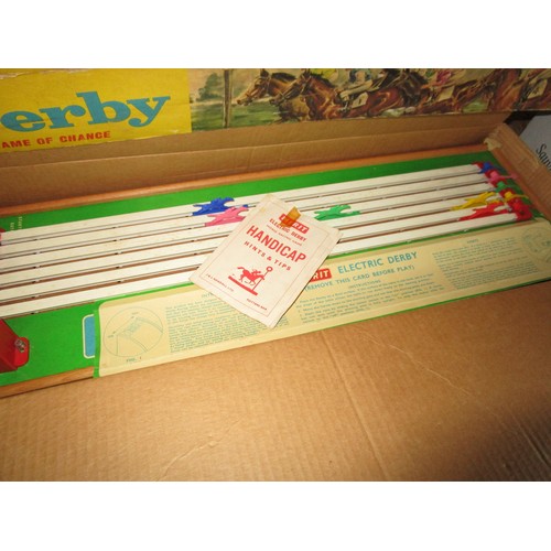 A vintage Merit Horse Racing game and a boxed roulette wheel game