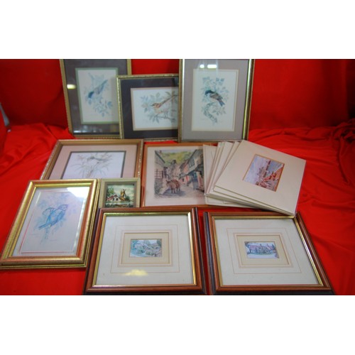 A box of assorted pictures