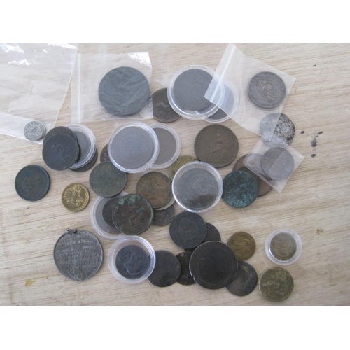 An assortment of Georgian coins and tokens including a 'Napoleon St ...