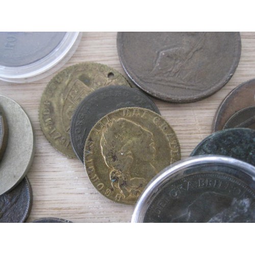 An assortment of Georgian coins and tokens including a 'Napoleon St ...
