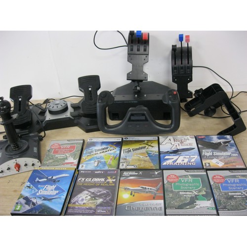 A stack of Microsoft Flight Simulator CDs and DVDs including expansion ...