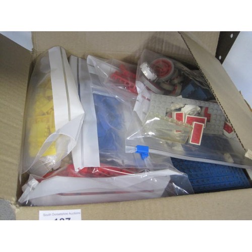 Box of assorted Lego bricks and components, including motor and ...