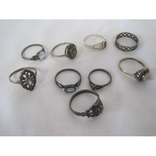 Nine gem-set silver rings