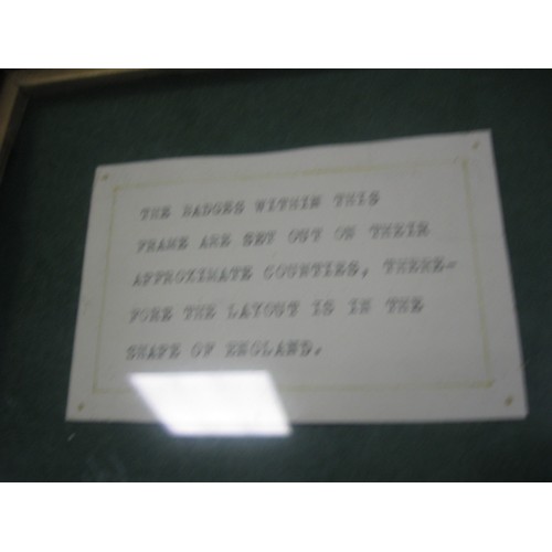 A framed and glazed collection of WW1 military cap badges, in good ...