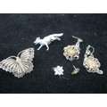 An A R Brown pewter fox lapel brooch, a white metal filigree butterfly ...
