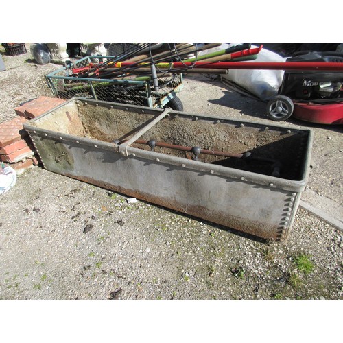 A large metal trough of rivetted construction, some holes but would ...