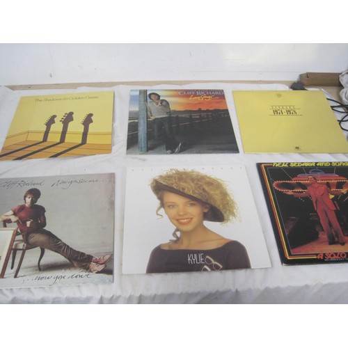 A crate containing a selection of vinyl LPs including 1980s