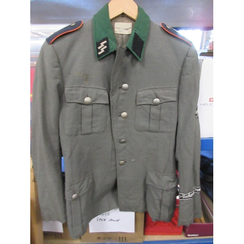 A reproduction SS uniform which the vendor advises us was used in the ...