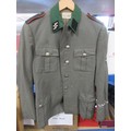 A reproduction SS uniform which the vendor advises us was used in the ...