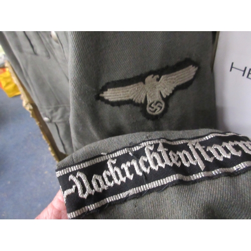 A reproduction SS uniform which the vendor advises us was used in the ...