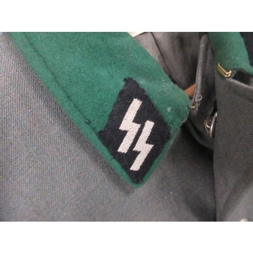 A reproduction SS uniform which the vendor advises us was used in the ...