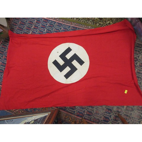 A large WW2 German Nazi flag, linen, the Nazi emblem sewn onto the red ...
