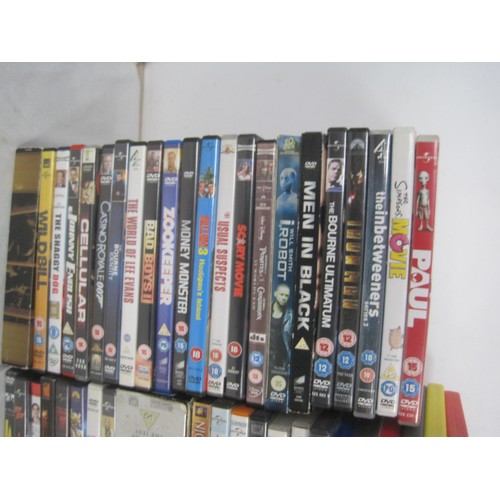 a large quantity of DvDs including 1 still in its original plastic ...