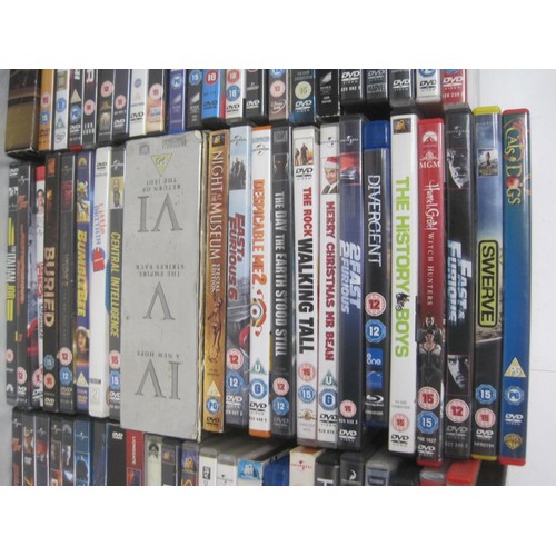a large quantity of DvDs including 1 still in its original plastic ...