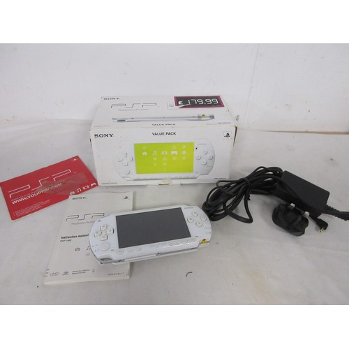 A Sony PSP in ceramic white, model PSP-1003kcw, boxed with power supply ...
