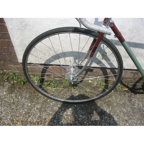 An unnamed vintage racing bicycle rolling frame, in very good order and ...