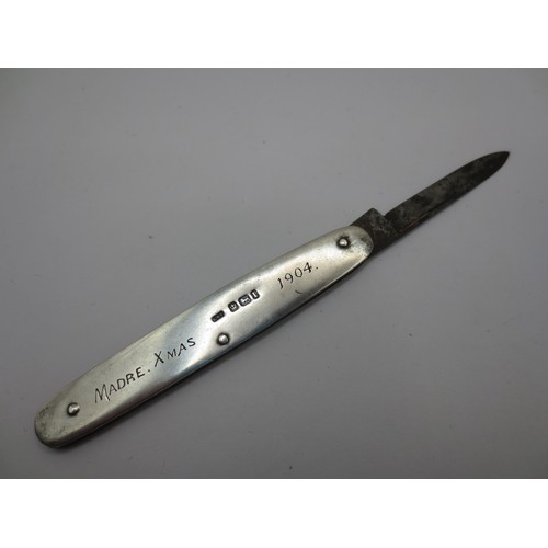 A sterling silver fruit knife, British hallmarks, the scale engraved ...