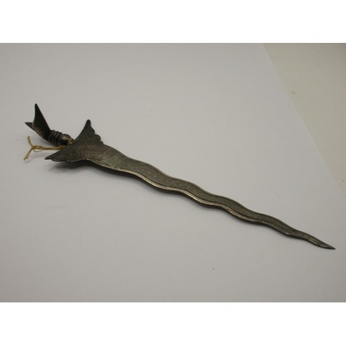 A decorative dagger with engraved wavy blade, Arabic script, the ...
