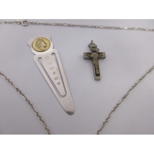A silver bookmark, a silver cross pendant and chain, and a metal ...