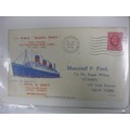 A black album of assorted first day covers, postcards, and books of GB ...