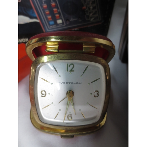 a lot comprising of a Remington electric shaver, westclox travel clock ...