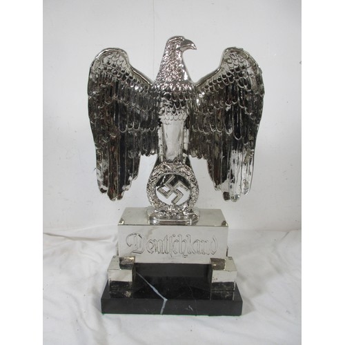 A very large silvered Nazi Parteiadler desk ornament: the eagle with ...