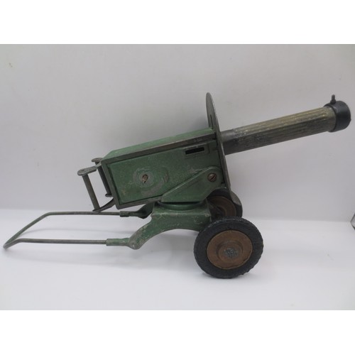 A vintage or antique Soviet-made Maxim machine gun on rubber-wheeled ...