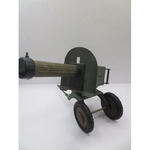 A vintage or antique Soviet-made Maxim machine gun on rubber-wheeled ...
