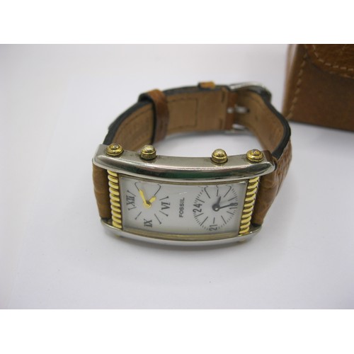 A Fossil gents quartz dual time wristwatch, a quartz watch marked Swiss ...
