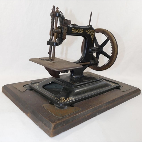 A Singer Manufacturing Company model 30K chain stich sewing machine, on ...