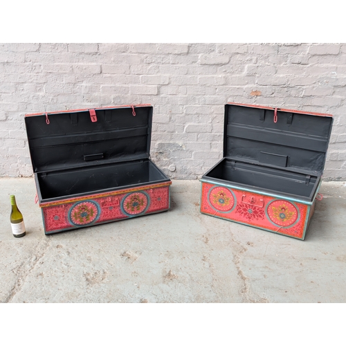 Two large metal trunks with similar hand painted decoration. Dimensions ...