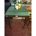 A vintage folding bridge table