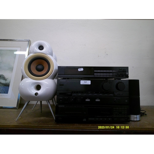 A Kenwood music system together with a pair of futuristic audio ...