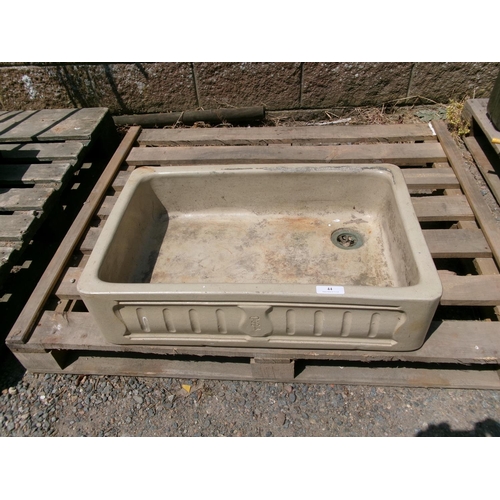 A vintage salt glazed stone ware sink