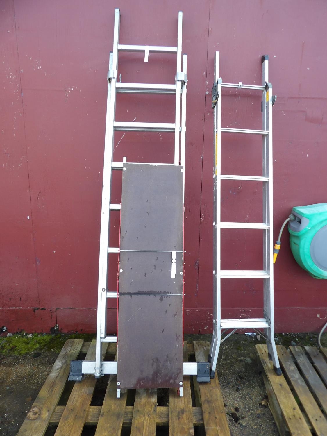 A Youngman 100 Pro-deck combined ladder and deck together with a ...